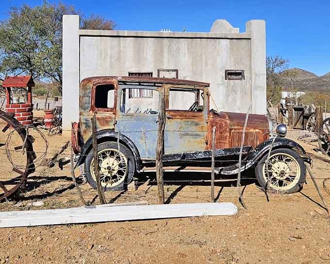 This vintage automobile has earned its retirement, rusting gracefully into a sculpture that museums would envy.