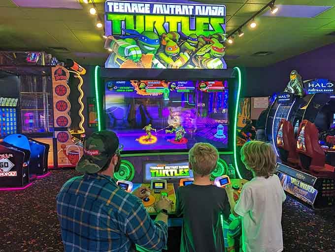 Three generations, one arcade machine, zero arguments about what to play next. That's the Grand Slam magic right there.