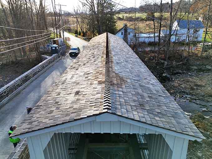 From above, the wooden shingle roof reveals a craftsmanship so meticulous it looks like someone hand-placed every single piece.