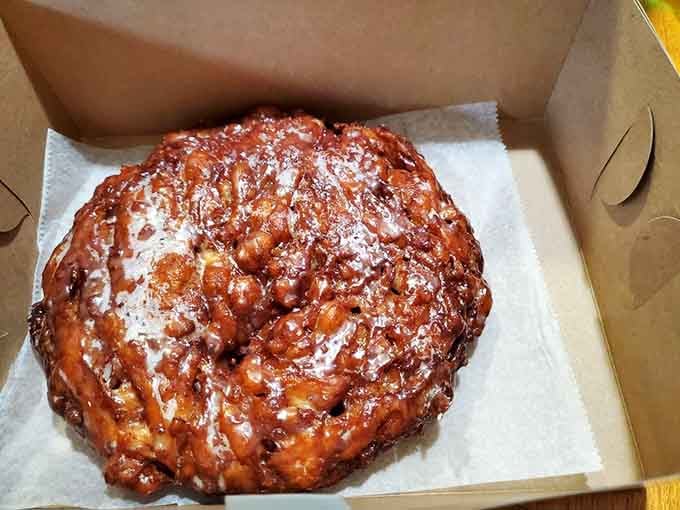 That apple fritter is gloriously lumpy, sticky, and golden, which is exactly how a great fritter should look.