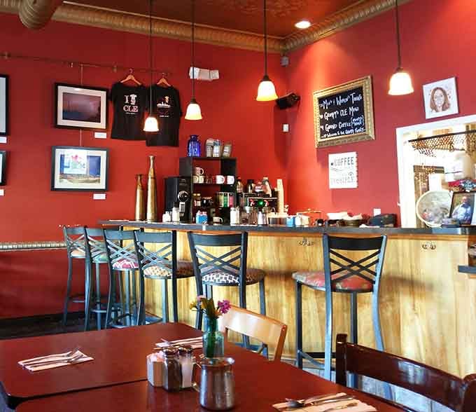 Bold red walls, local art, and a coffee bar that sets the tone for everything delicious that follows.