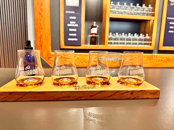 Four glasses, one wooden flight board, and the words "You do Bourbon." Yes, yes you do.