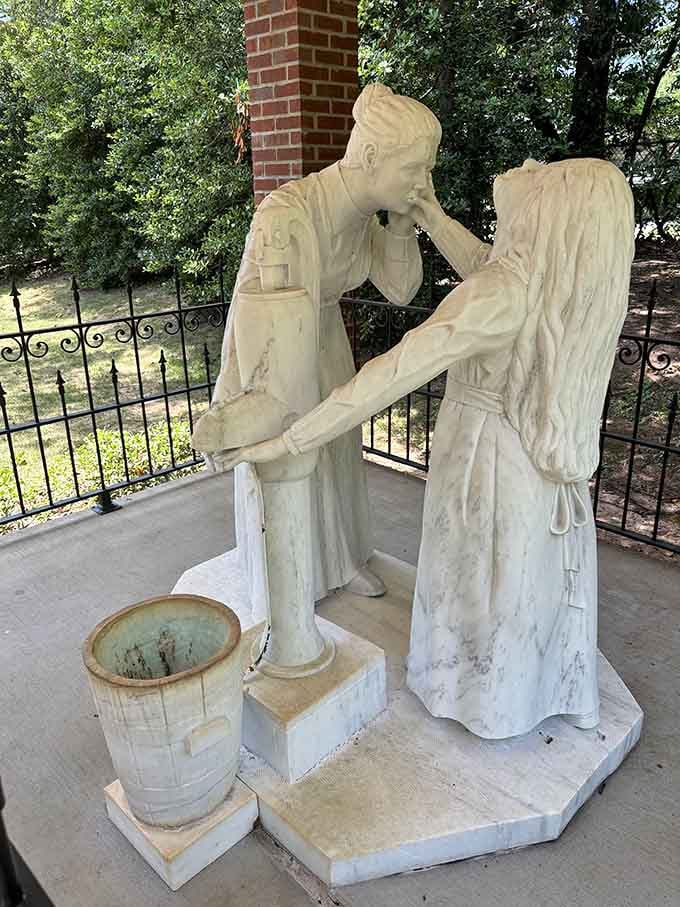 Anne Sullivan and Helen Keller, captured in marble, frozen at the moment language became real for one little girl.