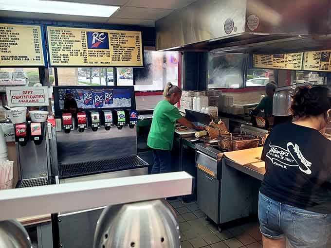 Steam rising, fryers humming, staff moving with purpose, this kitchen is the beating heart of everything wonderful happening at Henry's.