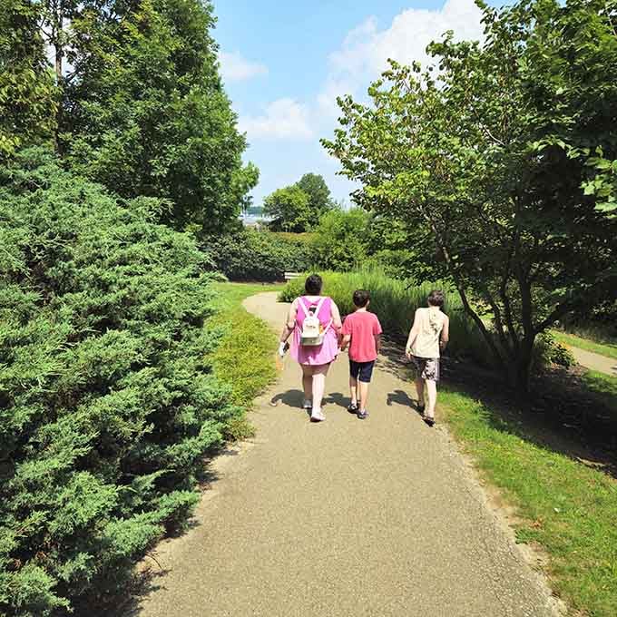 Three generations, one winding path, zero complaints. That's the Highfield Discovery Garden effect working perfectly.