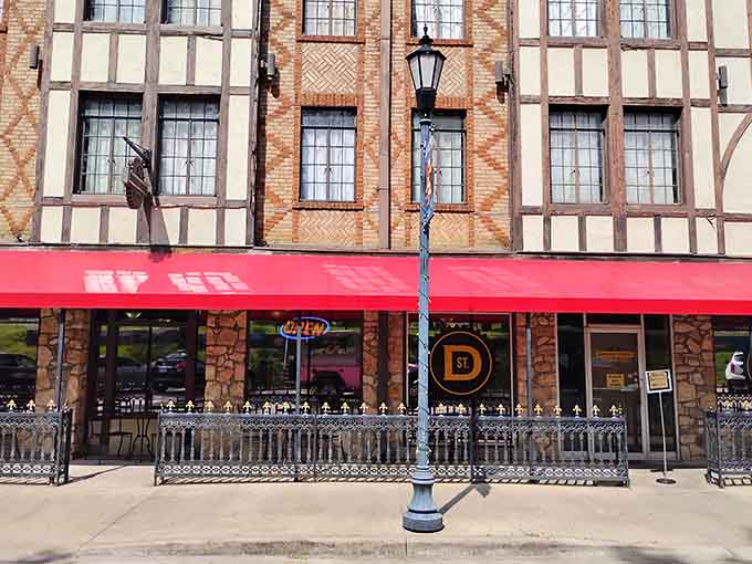 Downing Street Pour House brings bold red awnings and a lively atmosphere to one of Hollister's most striking Tudor buildings.