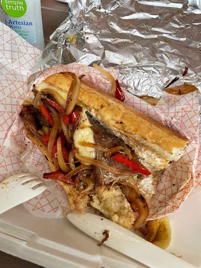 The Philly cheesesteak overflows with peppers, onions, and melted cheese that'll have you planning your return visit immediately.