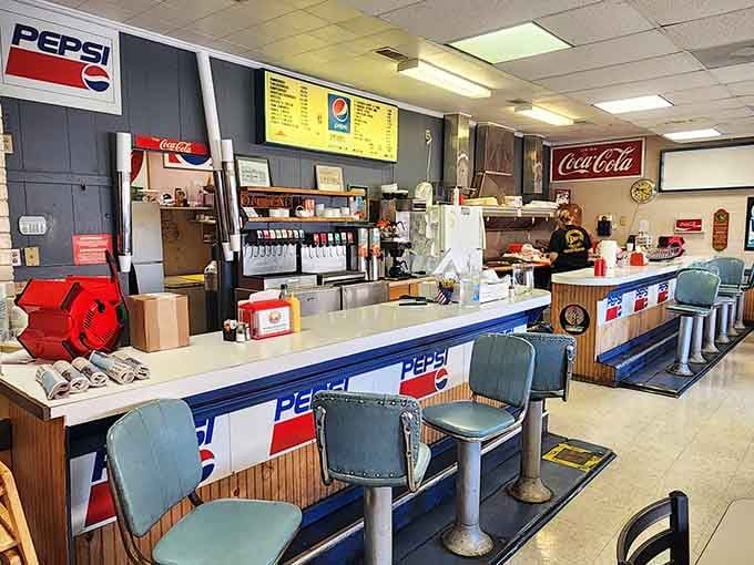 A long counter, blue stools, and a staff that's clearly seen a few thousand satisfied customers come and go.