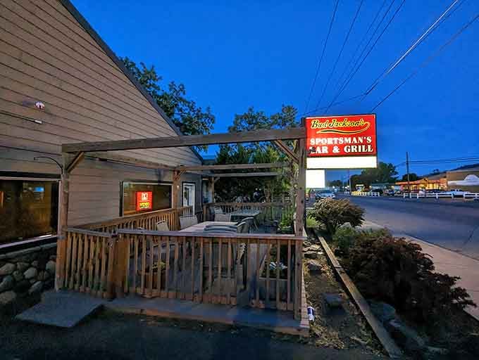 Bud Jackson's Sportsman's Bar and Grill glows warmly at dusk, practically daring you to pull up a chair.