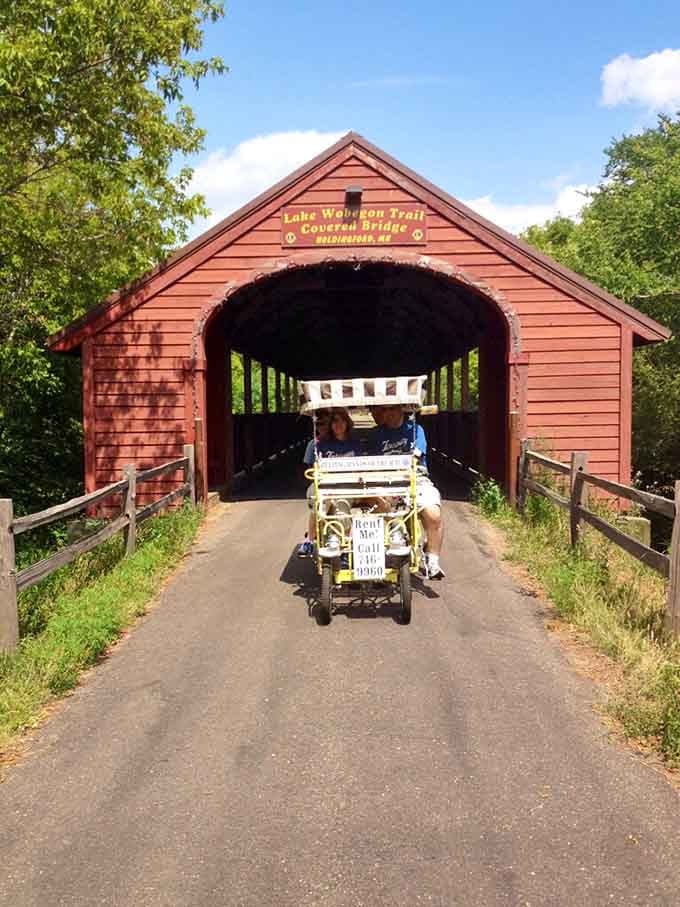 A pedal car rolling out of a covered bridge is the most joyful thing you'll see today.