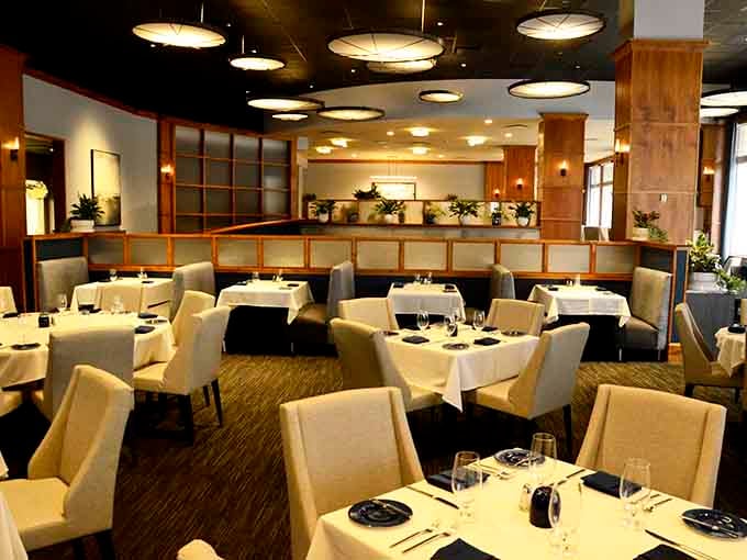 White tablecloths, warm lighting, and booth seating that makes every dinner feel like a special occasion.