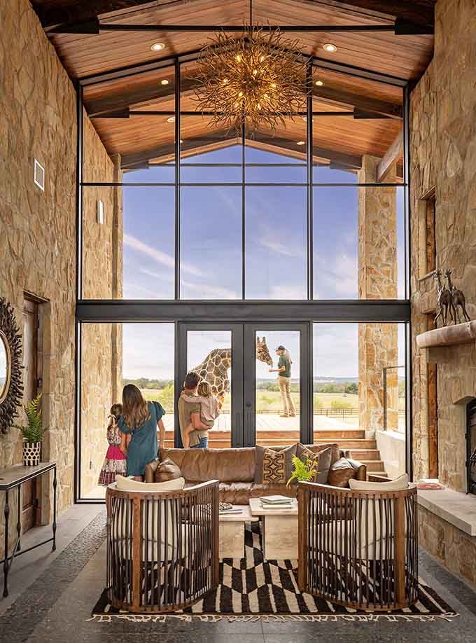 That floor-to-ceiling glass wall isn't showing a nature documentary. That's just Tuesday morning at Longneck Manor, and it's spectacular.