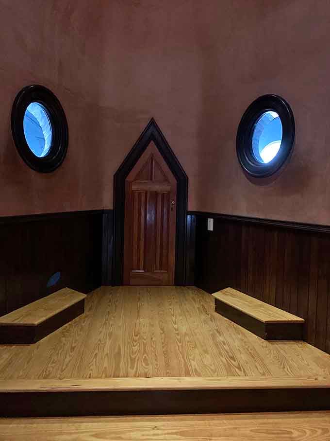 Circular windows frame the sky like porthole eyes, reminding you that you're standing inside architectural history and loving it.