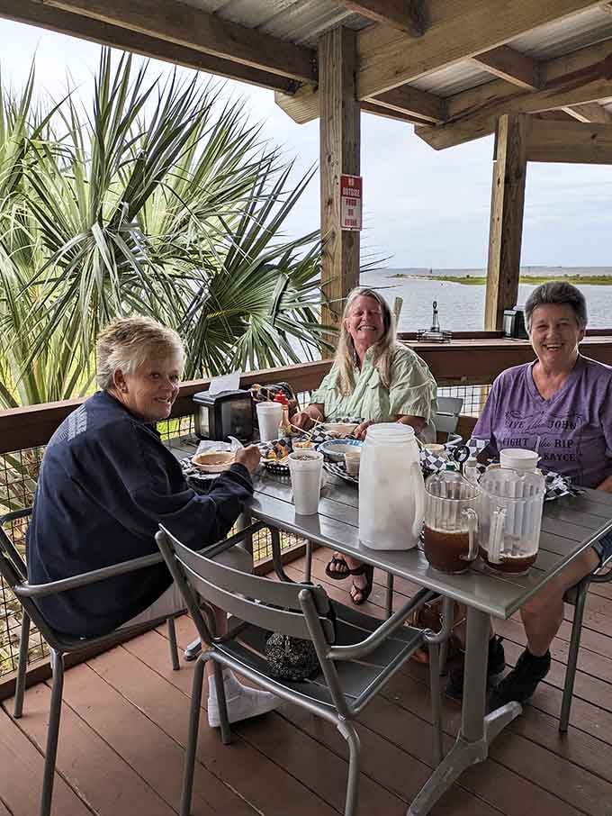 Good food, good company, and a waterfront view, the smiles at this table say everything you need to know about Lynn's.