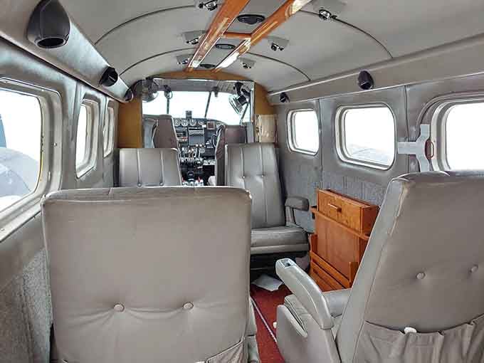 Step inside and you'll find surprisingly comfortable seating that once carried passengers across waters and through countless adventures.