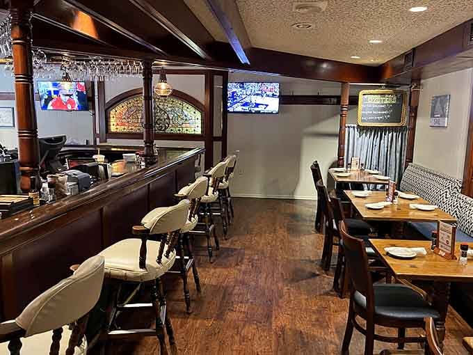 A proper bar area with warm wood tones and flat screens, because great seafood and good company deserve a comfortable spot.