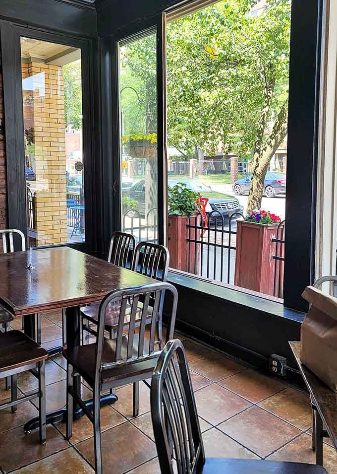 Window seats with a view of the street, perfect for watching the world go by over a pint.