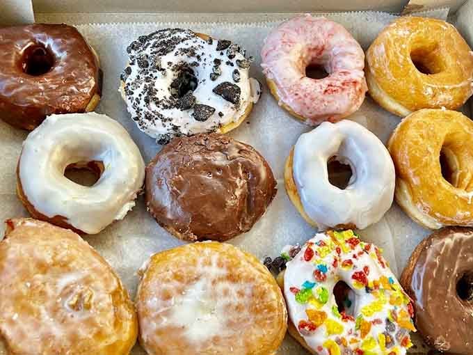 A dozen different donuts in one box. Choosing a favorite is the most delightful problem you'll have today.