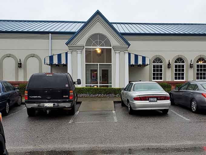House of Pizza has that welcoming, no-nonsense exterior that quietly promises the food inside is the whole point.