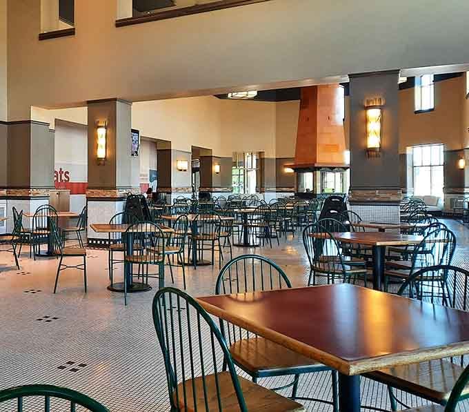 A proper dining hall with warm lighting and real tables. Outlet shopping is a marathon, and this is your pit stop.