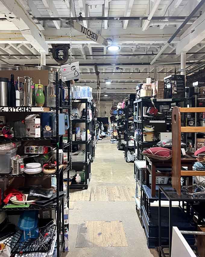 Aisle after aisle of kitchen goods stretching into the distance, a cook's paradise hiding right under a simple "Kitchen" sign.