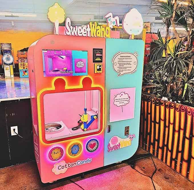 A cotton candy vending machine that operates itself. The future arrived, and it tastes like spun sugar.