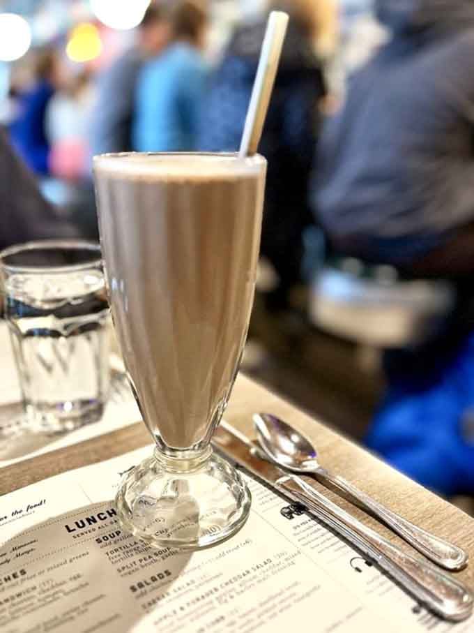 A classic milkshake served fountain-style because some traditions deserve to be honored and savored slowly.