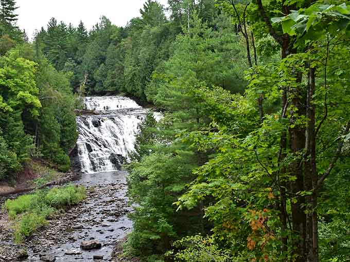 Surrounded by dense northwoods forest, the falls sit quietly like they've been waiting for you to show up.