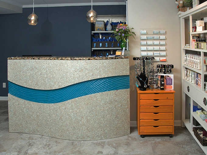 A reception desk with wave designs that whisper "calm down" before you even check in.