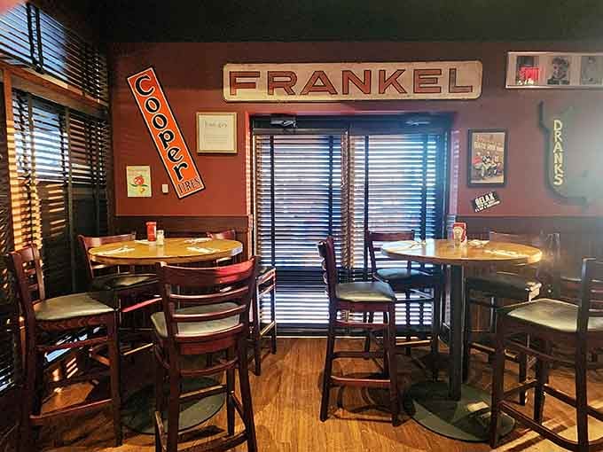 Vintage signs, warm lighting, and high-top tables. This corner of the Rusty Bucket feels like your favorite neighborhood secret.