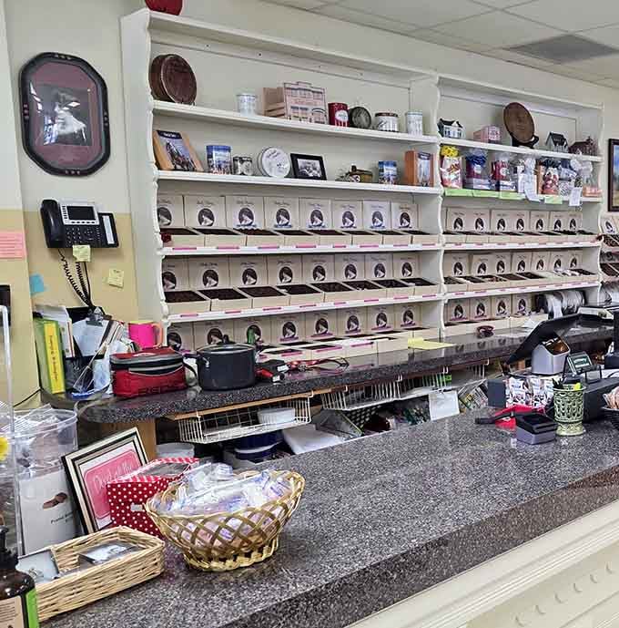 Behind that long counter, rows of Ruth Hunt candy boxes stand ready, proof that a century of tradition never goes out of style.