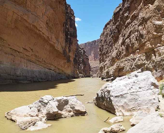 Muddy water, massive walls, zero complaints. The Rio Grande has been putting on this show for ages.