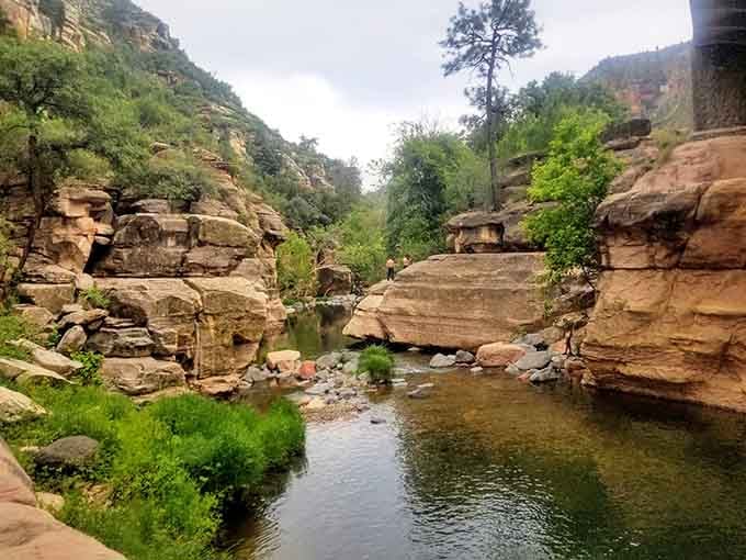 Smooth sandstone, green trees, and cold rushing water, nature's version of a five-star resort, no reservation needed.