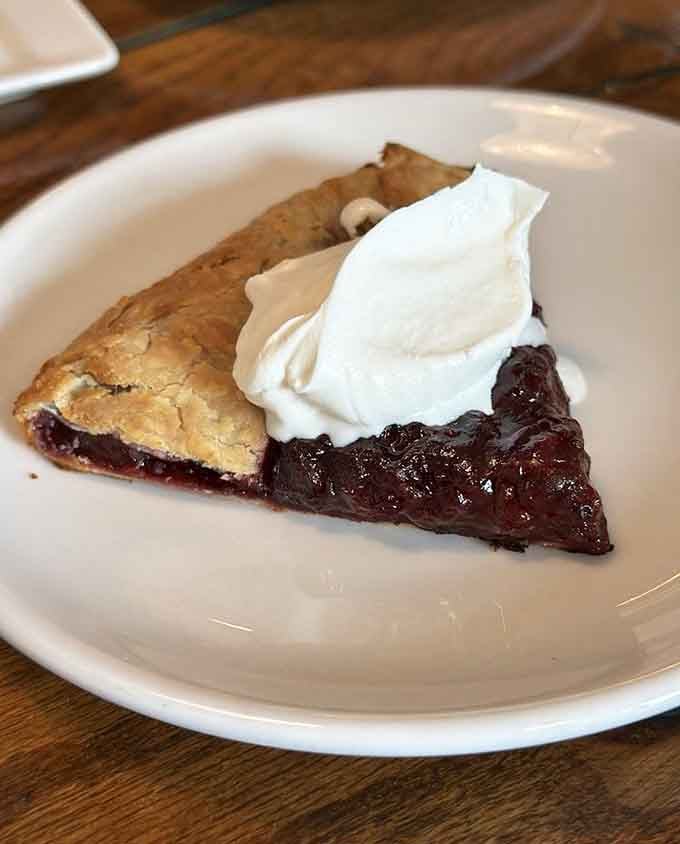 Blackberry tart with whipped cream is the sweet ending your river adventure absolutely deserves, no question.