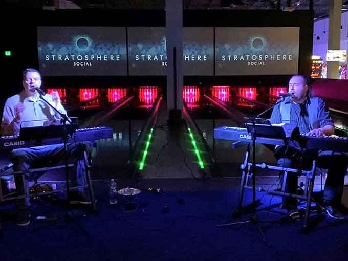 Live keyboard music in front of the bowling lanes, because some nights just call for a little extra soundtrack.