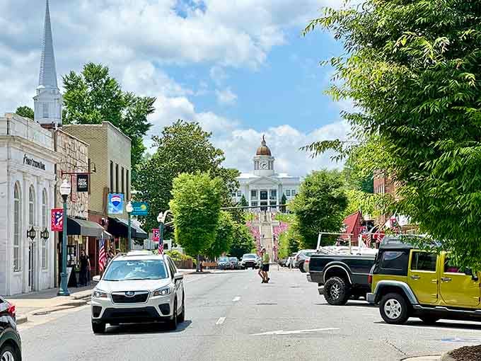 Looking down Main Street feels like driving into a postcard where the mountains photobomb every single picture perfectly.