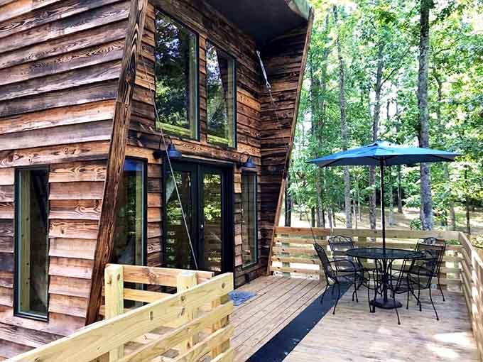 The hallway leads straight to the deck and the trees beyond. Every step feels intentional here.