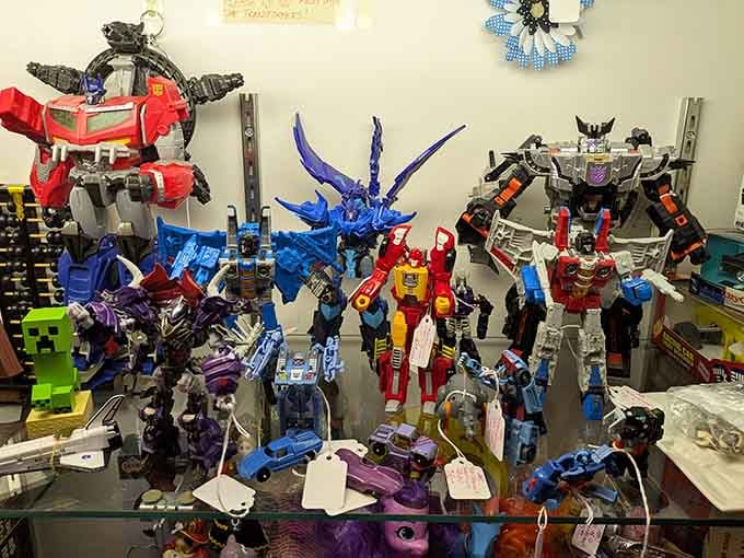 A whole army of Transformers standing at attention, ready to follow you home if you'll have them.
