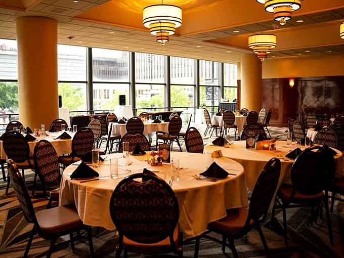 A beautifully set room where every seat comes with a mystery, a meal, and a suspect nearby.