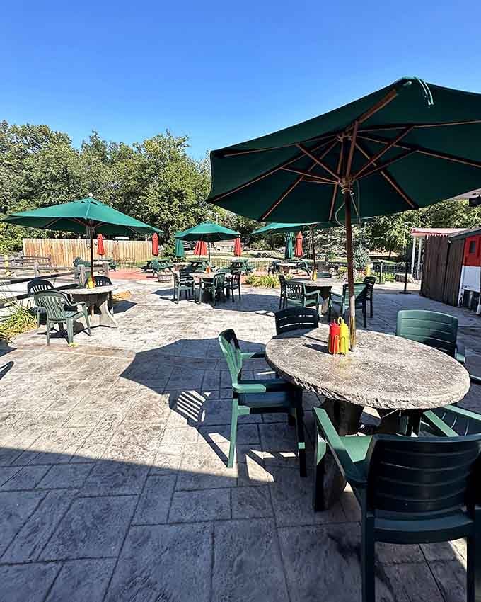 Shaded tables, open sky, and good food waiting, this outdoor patio is what warm afternoons were made for.