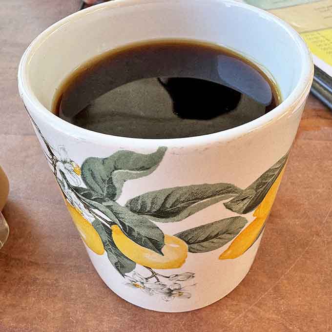Coffee served in cheerful cups because even your caffeine delivery system should make you smile.