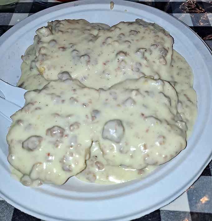 Biscuits drowning in sausage gravy are the kind of indulgence that makes early mornings worthwhile.