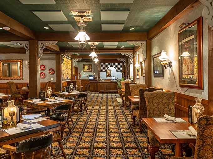 The main dining room stretches out with patterned carpets and period lighting that would make any interior designer weep with joy.
