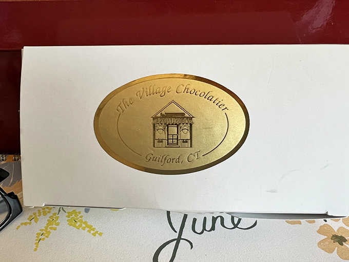 Even the packaging gets the gold-seal treatment because presentation matters when chocolate's this good.