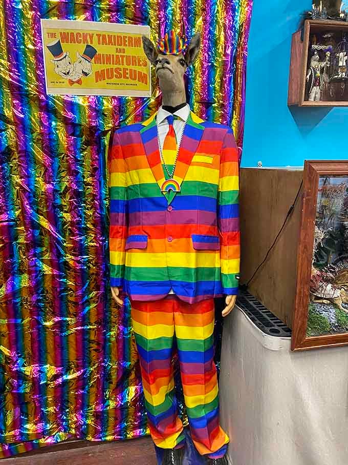 A deer head in a full rainbow suit is somehow the most confident thing you'll see all week.