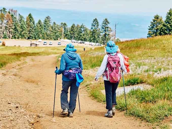Two hikers discovering what locals have quietly known for years: Oregon's trails deliver views worth every uphill step.