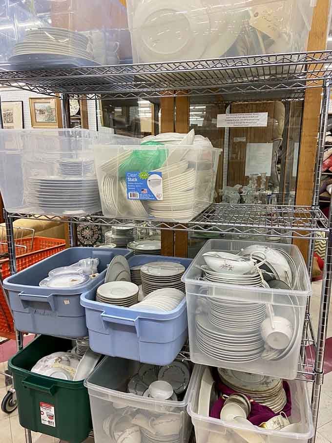 Stacked bins of dinnerware in every style imaginable, because apparently someone out there has a lot of dinner parties.