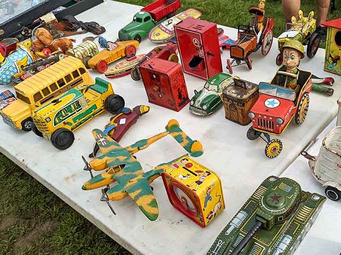 Vintage tin toys that survived decades and still look ready for one more adventure around the living room floor.