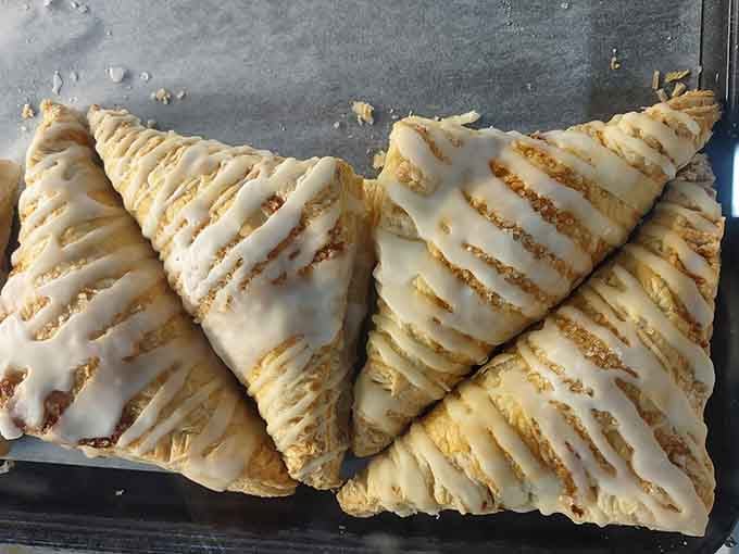 Flaky, golden, glaze-drizzled apple turnovers that look like they just won a county fair ribbon. Because they deserve one.
