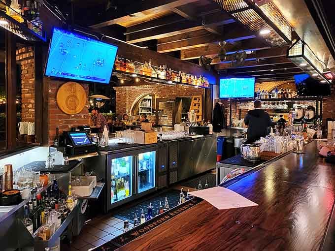 Exposed brick, warm lighting, and a full bar stocked and ready. The kind of place where one drink becomes three.